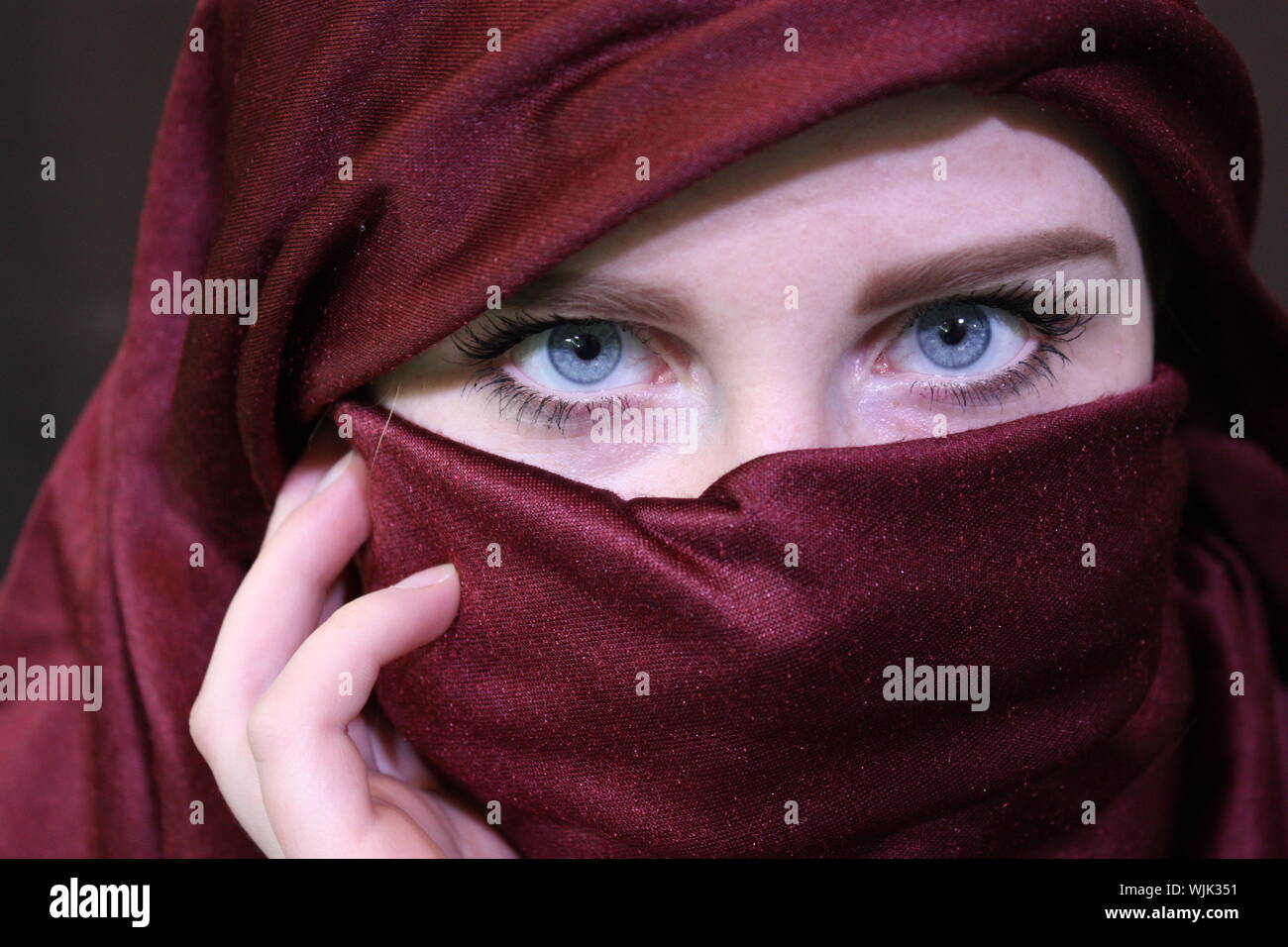 Maroon women hi-res stock photography and images - Alamy
