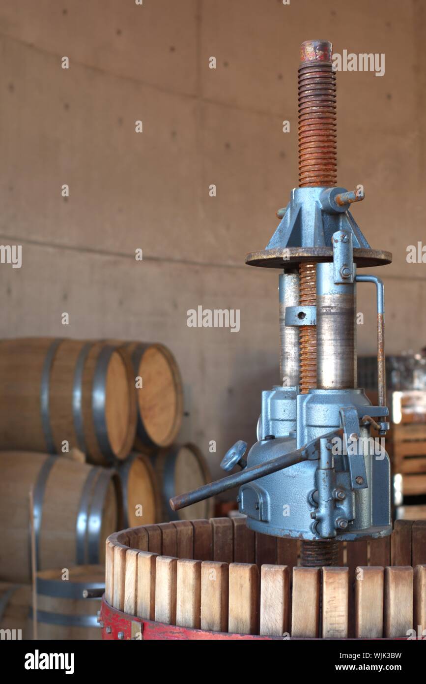 Old rusty wine press at a winery Stock Photo - Alamy