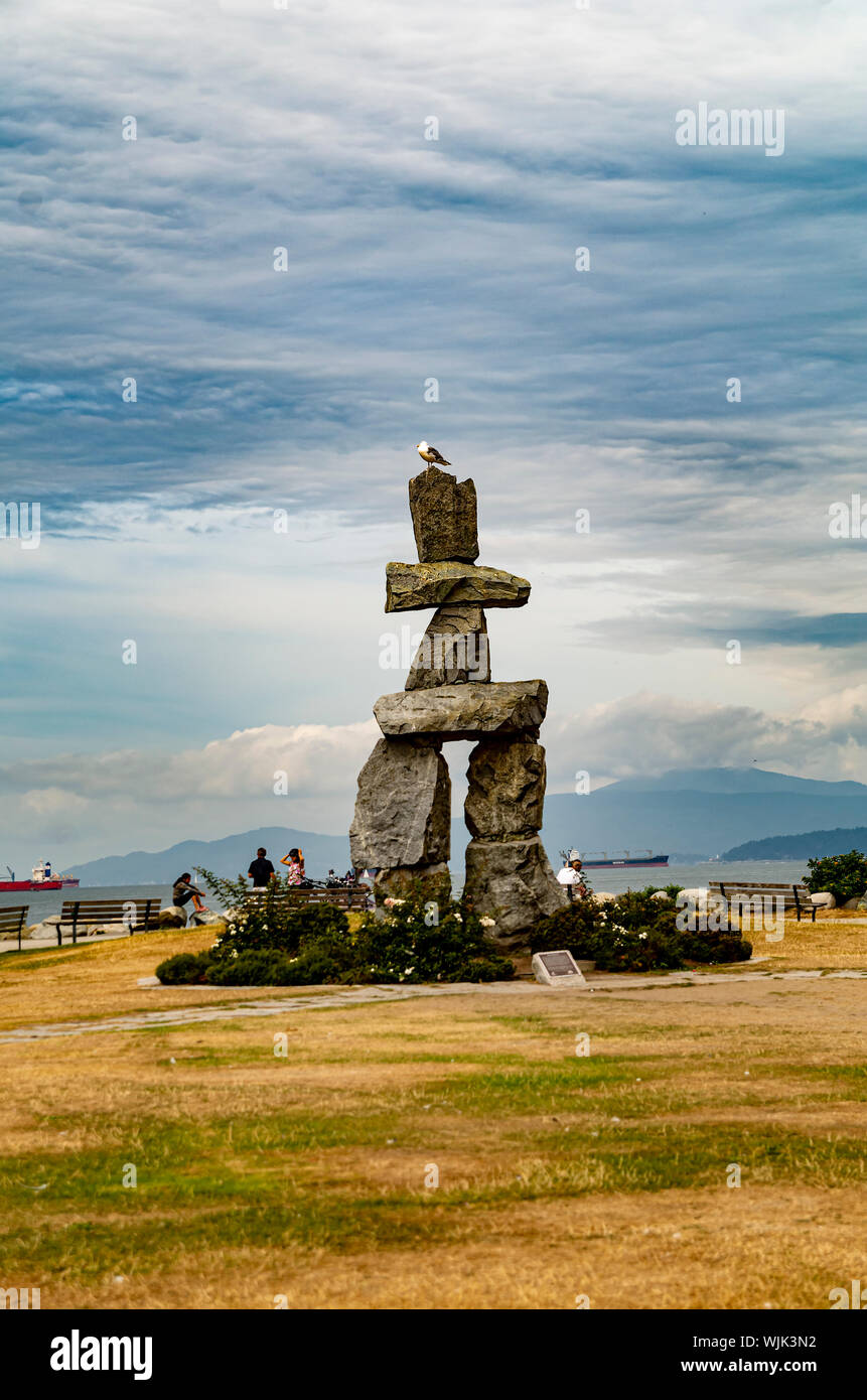 Large Inukshuk along the seawall walkway Stock Photo - Alamy