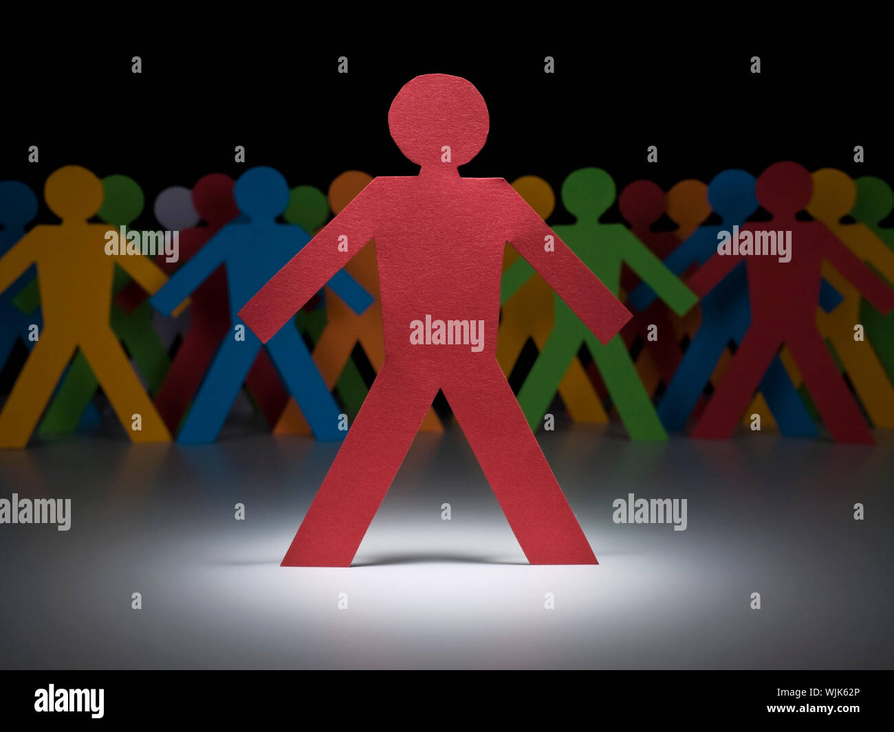 Figure under spotlight hi-res stock photography and images - Alamy