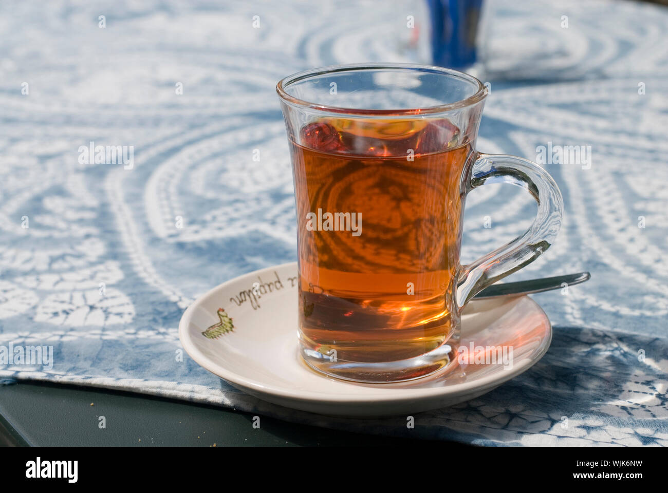 glass of tea outdoor in the sun Stock Photo - Alamy