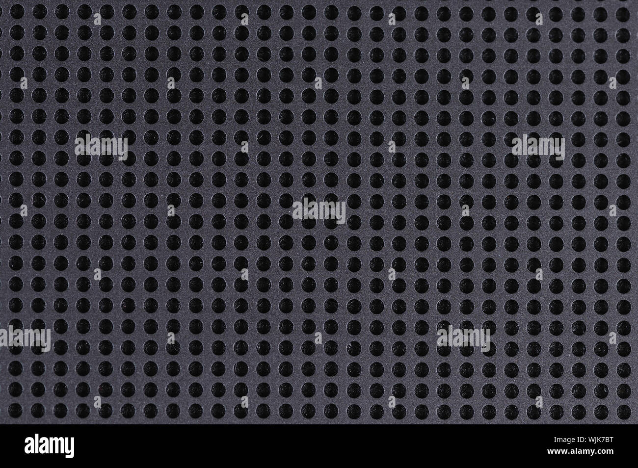 metal grid with some holes in it Stock Photo - Alamy
