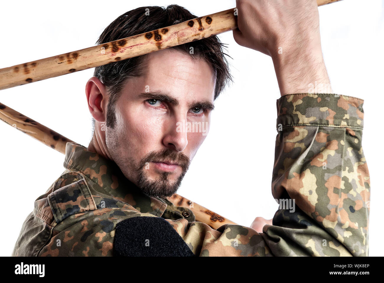 Male self defense instructor with camouflage do a self defense exercise ...