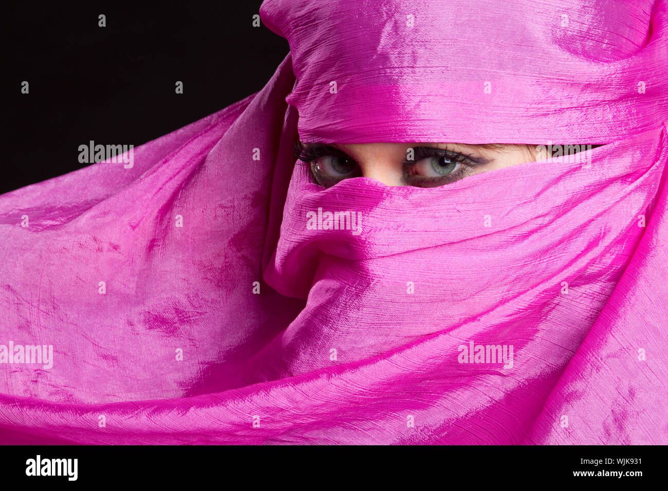 Attractive woman wearing pink scarf hi-res stock photography and images ...