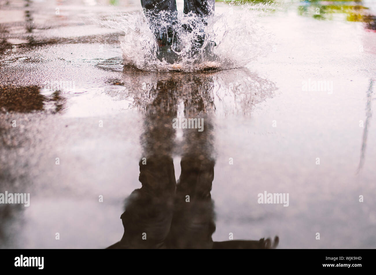 Splashing In Puddle High Resolution Stock Photography and Images - Alamy