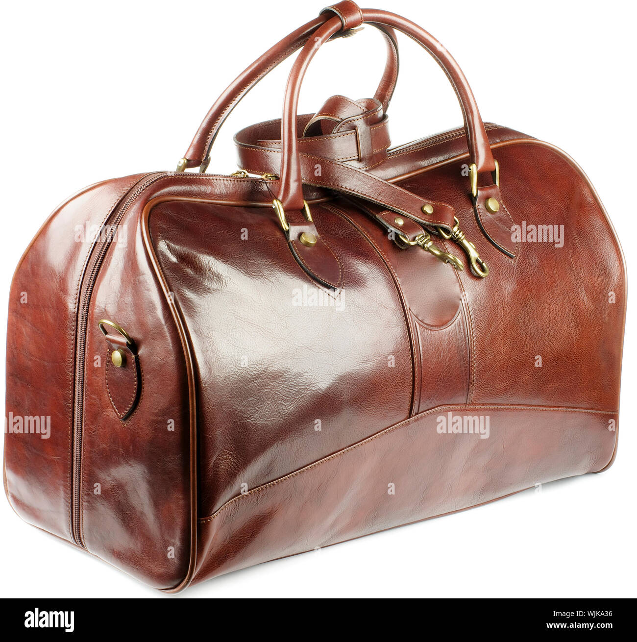 Big Ginger Leather Traveling Bag with Gold Details and Handles isolated ...