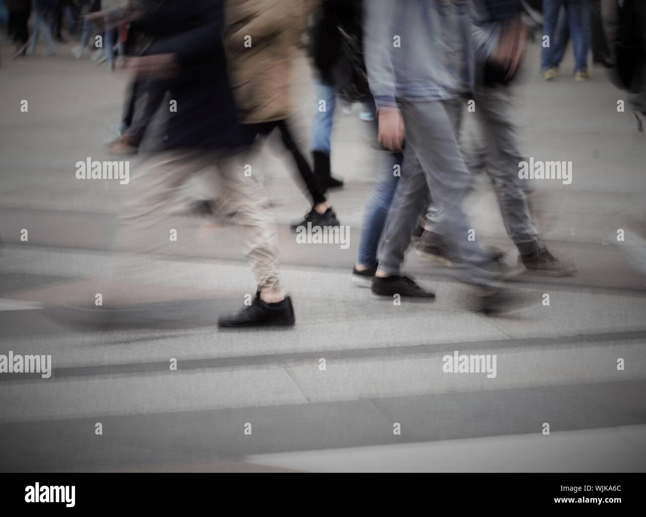 Low people walking street city motion hi-res stock photography and ...