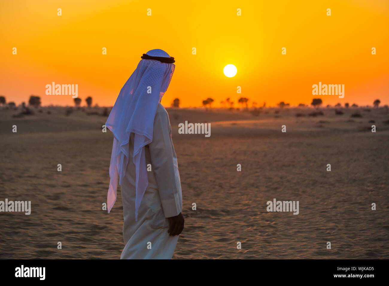 Arab in the Arabian desert on a hot sunny day Stock Photo - Alamy