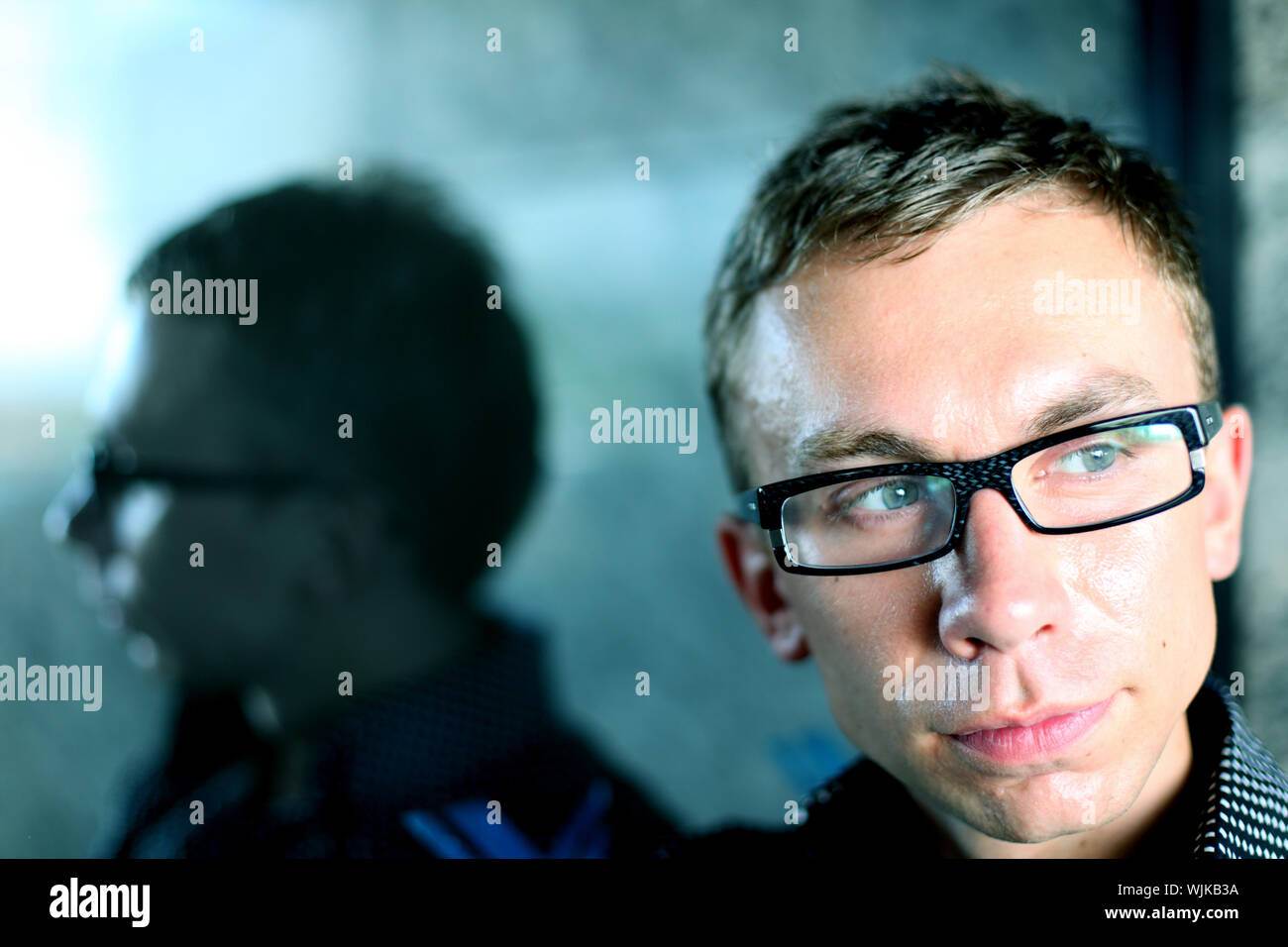 man and his reflection in glass Stock Photo - Alamy