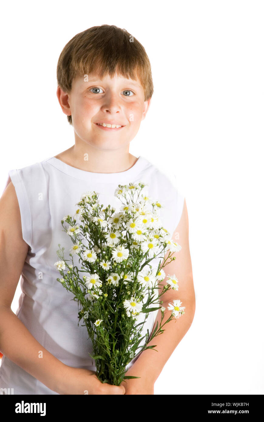 A young boy is giving flowers as a present Stock Photo - Alamy