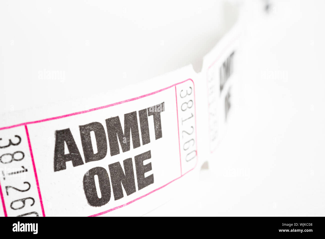 A macro or close-up shot of a strip of generic white sequentially ...