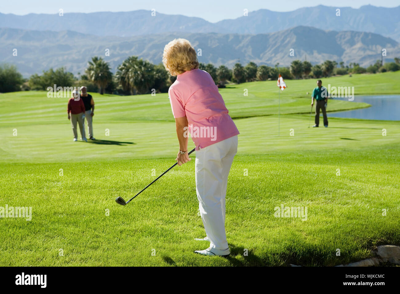 Senior golf player aiming hi-res stock photography and images - Alamy