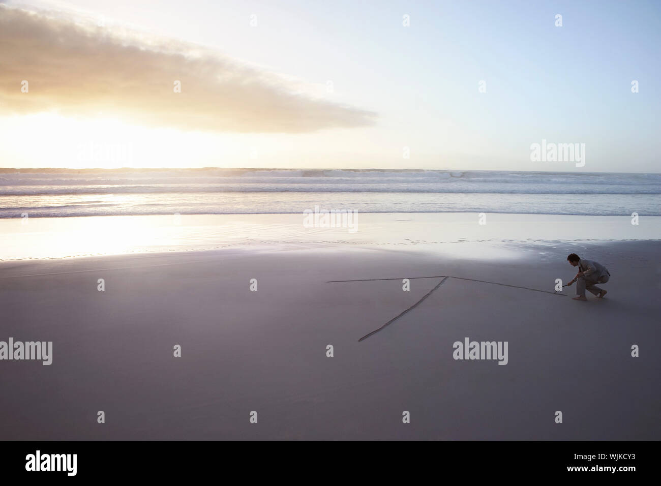 Stick drawing in the sand hi-res stock photography and images - Alamy