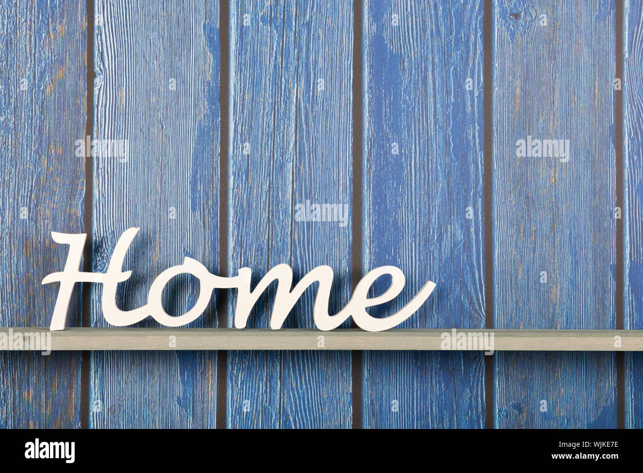 Home in white letters isolated on background Stock Photo - Alamy