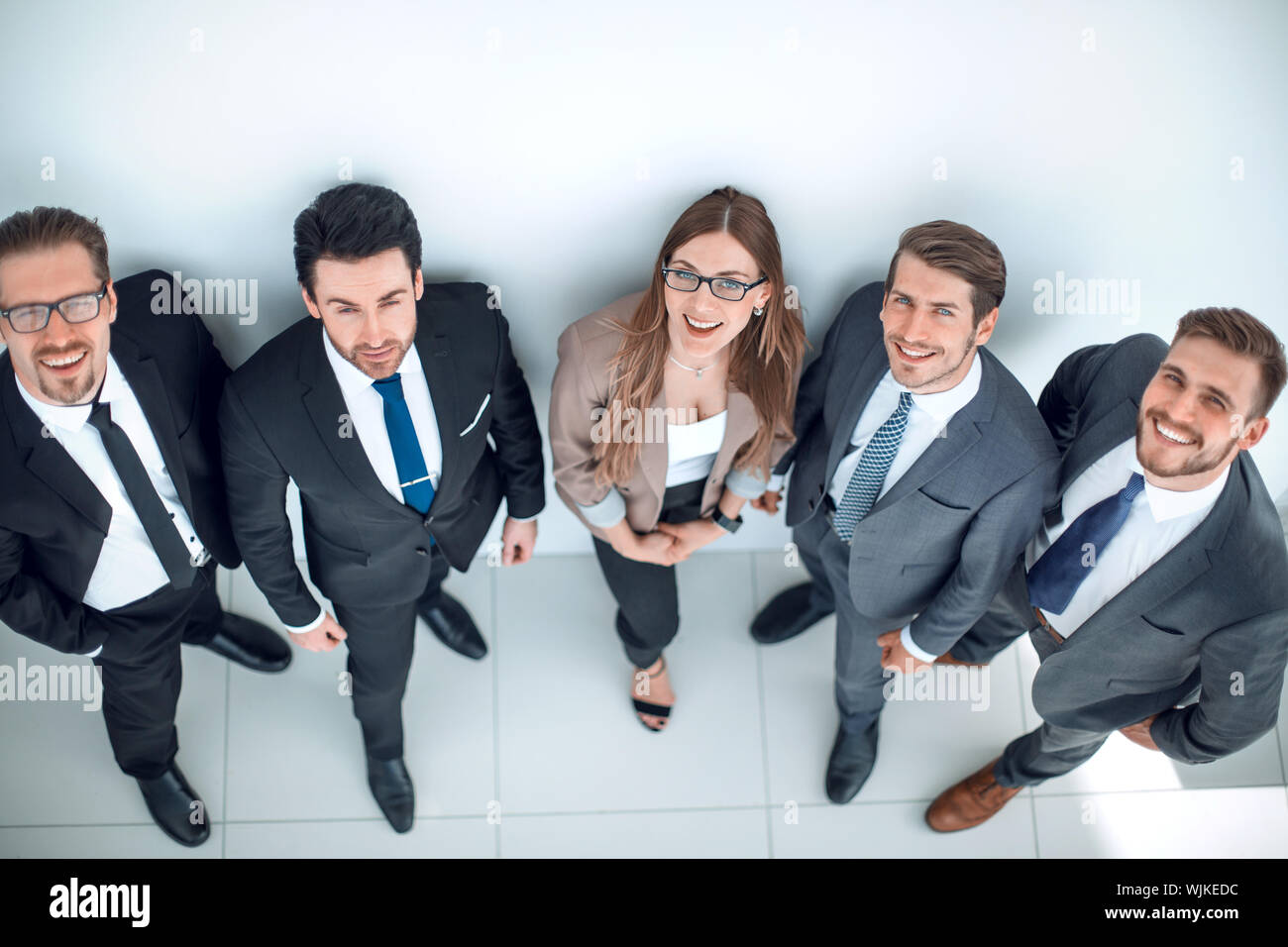 Successful business team looking upwards hi-res stock photography and ...