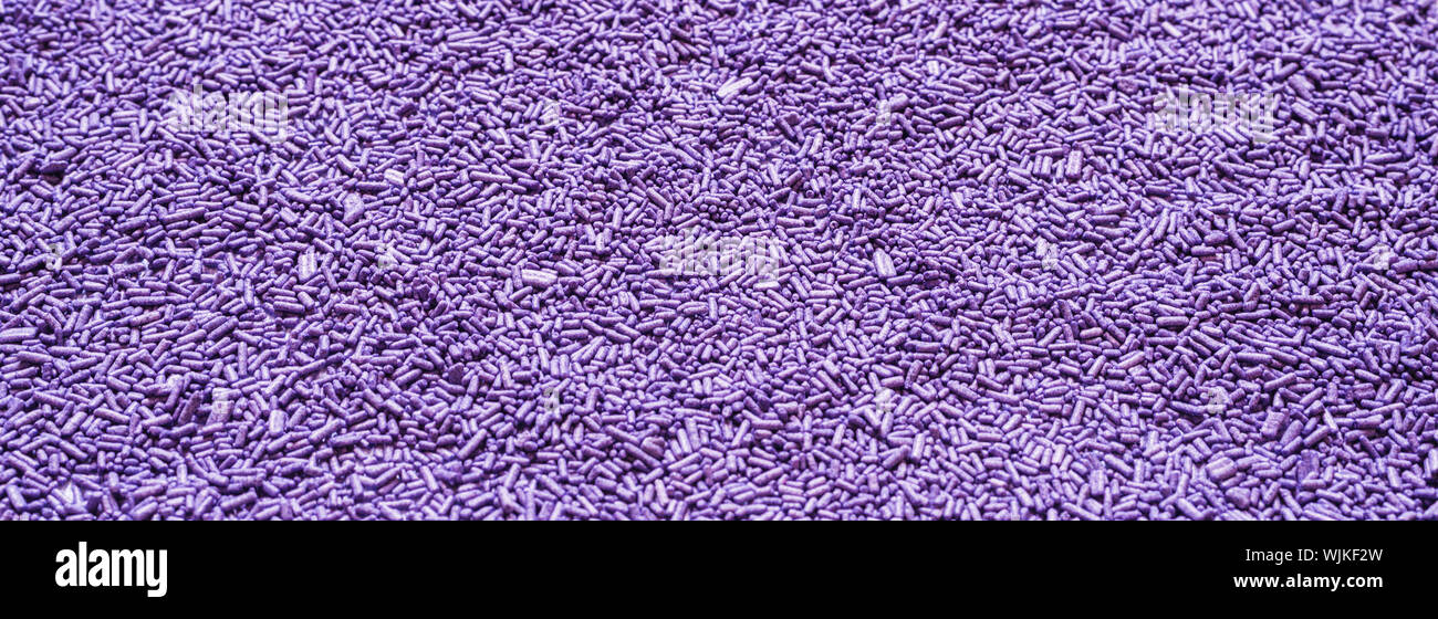 Background of colorful purple sprinkles. Food texture and pattern Stock ...
