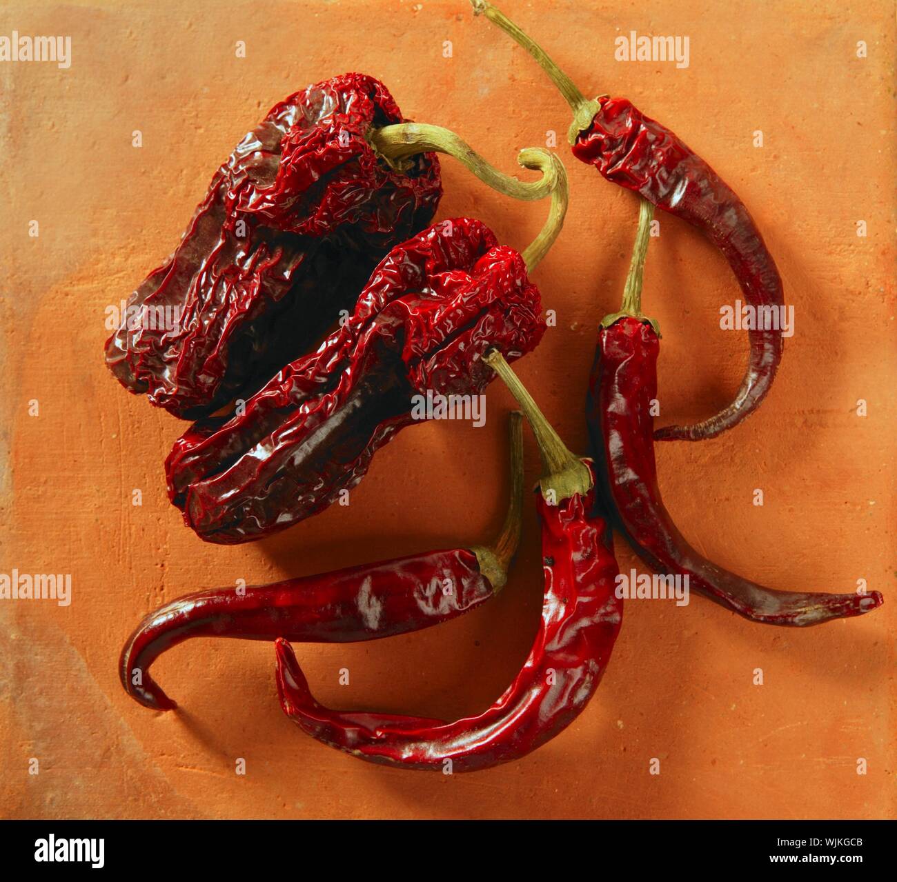 Red dried hot chili peppers Stock Photo - Alamy