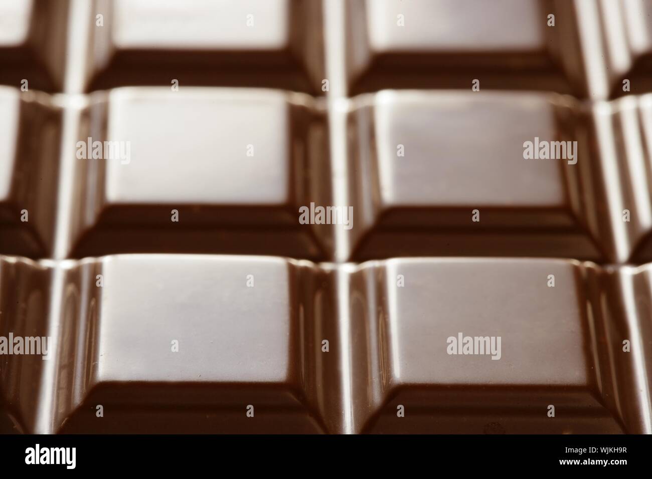 Chocolate brown bar, squares texture, detail macro Stock Photo - Alamy