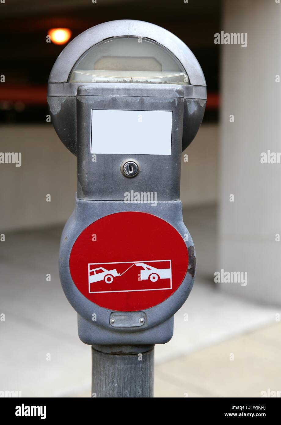 American parking meter macro detail with red circle Stock Photo - Alamy