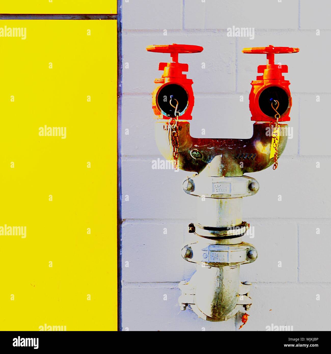 Fire Hydrant On Wall High Resolution Stock Photography and Images - Alamy