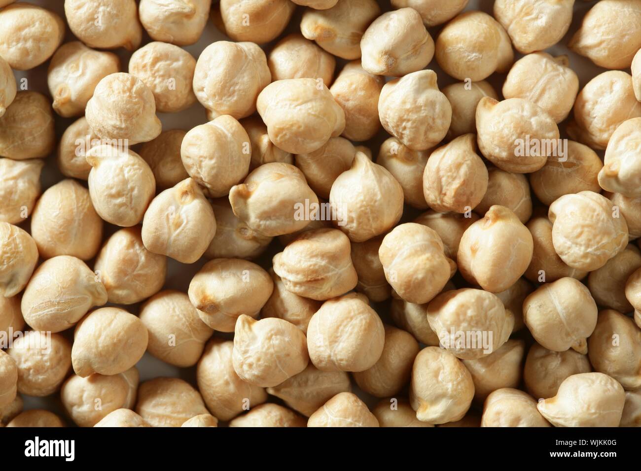 Chickpeas texture background at studio as a food pattern Stock Photo ...