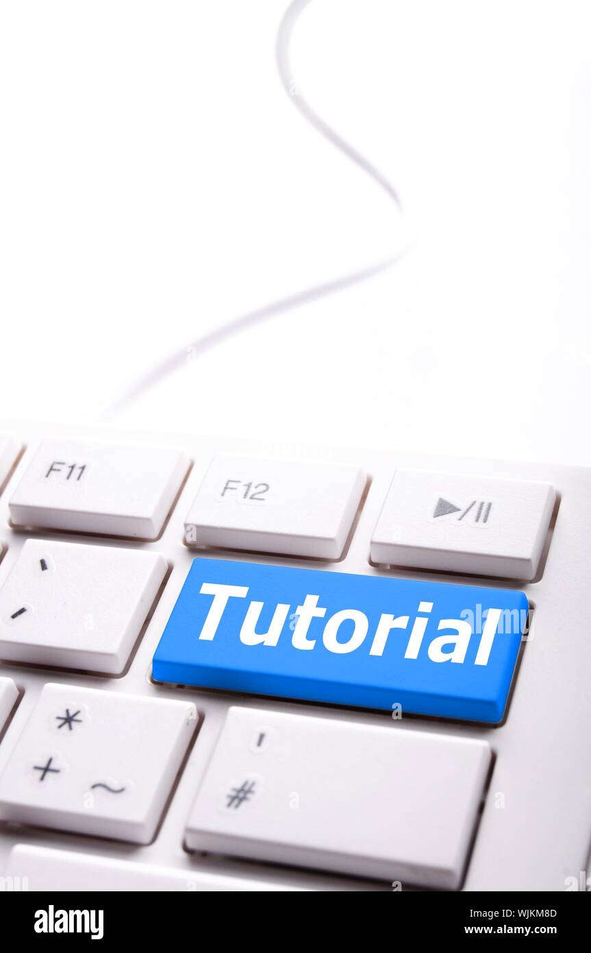 tutorial key with word showing internet or online software education ...