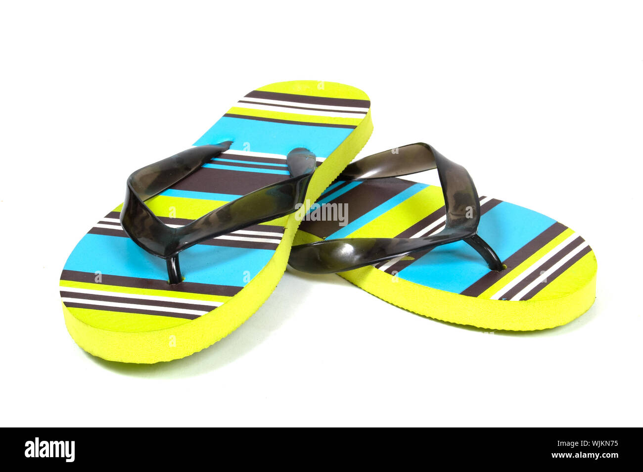 Bright colored flip-flops on a white background Stock Photo - Alamy