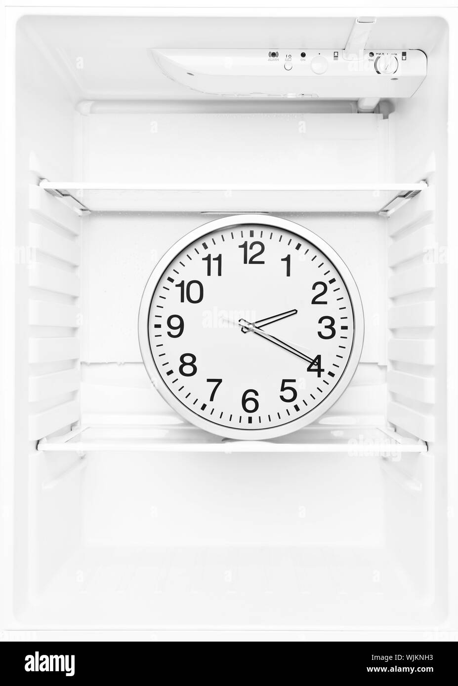 Big Clock in the fridge Stock Photo - Alamy