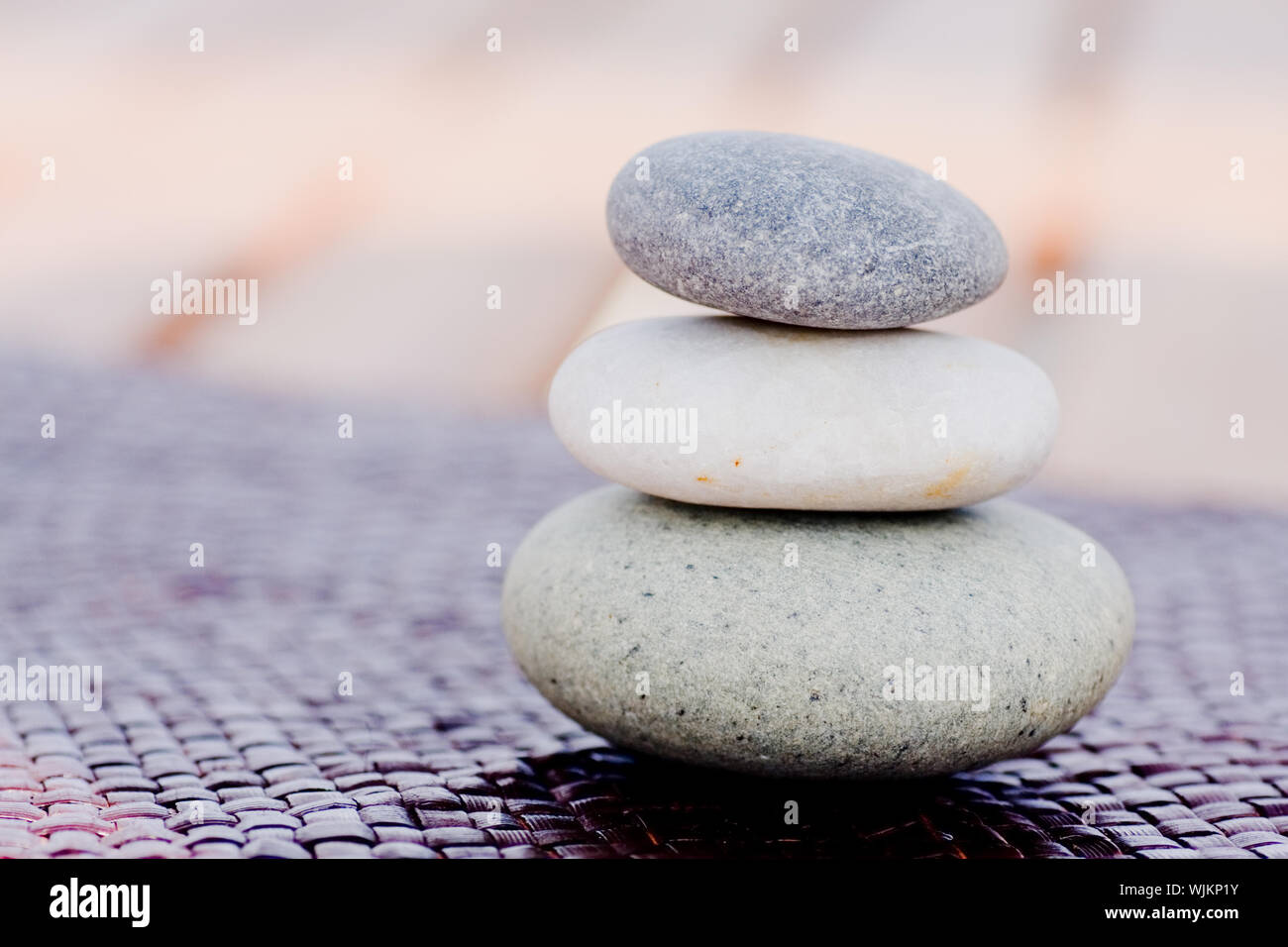 Three zen stones stacked on top of each other, spa concept Stock Photo ...