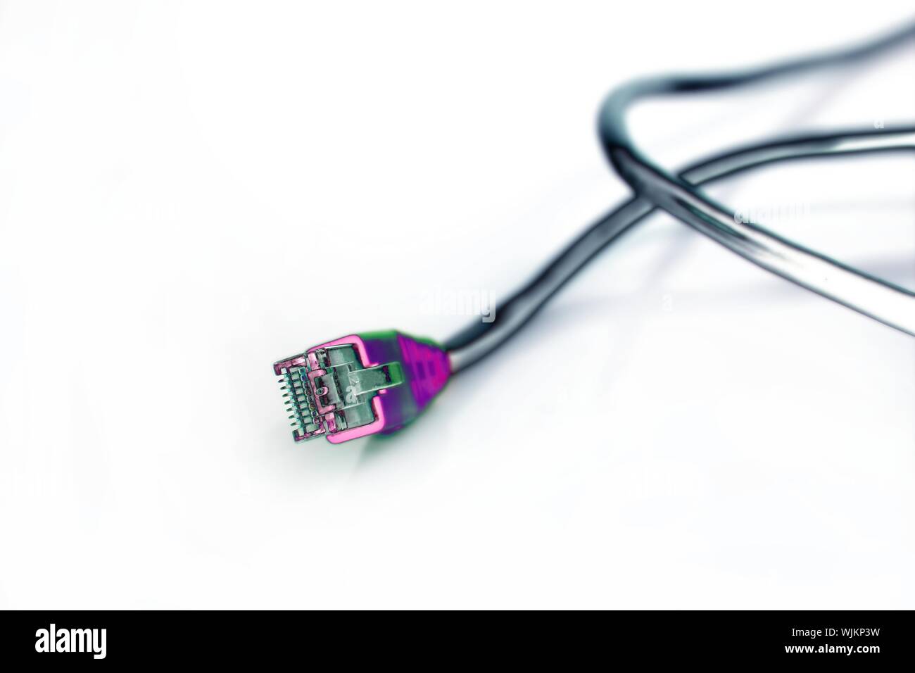 Ethernet rj45 cable isolated over white studio background Stock Photo ...