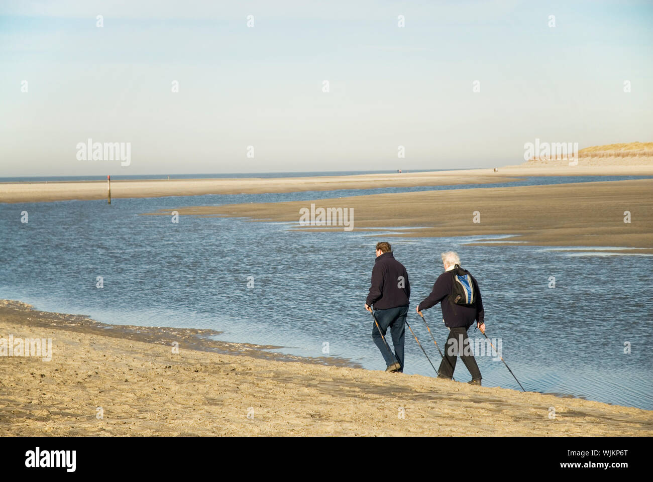 active elderly couple at the beach Stock Photo - Alamy