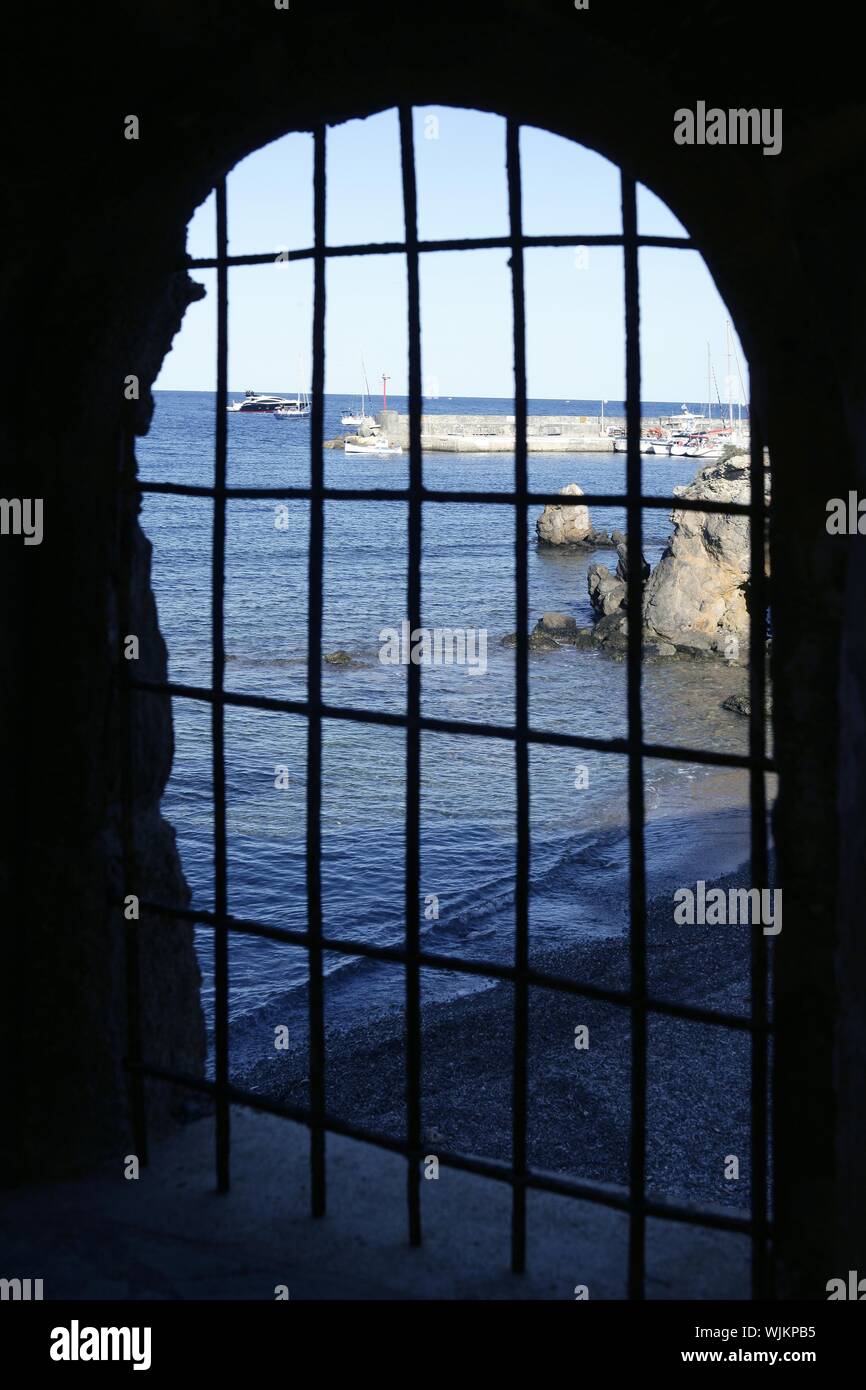 Blue sea behind the jail, arch window. Tabarca Island, Spain Stock ...