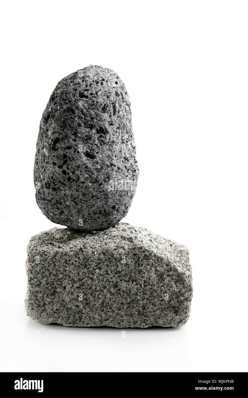 Volcanic Pumice, over granite brick stone on white background Stock ...