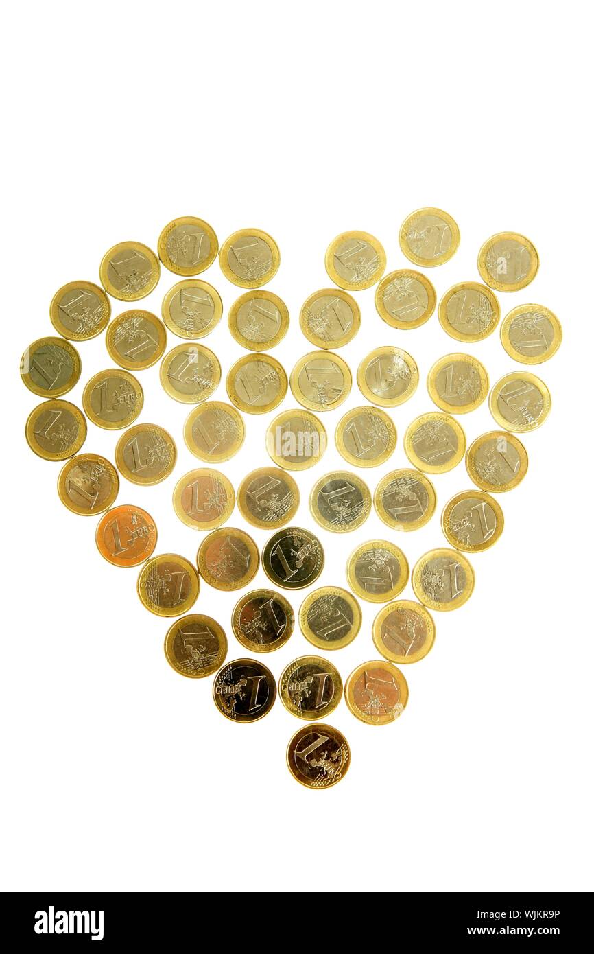 Euro currency coins in heart shape isolated on white Stock Photo - Alamy
