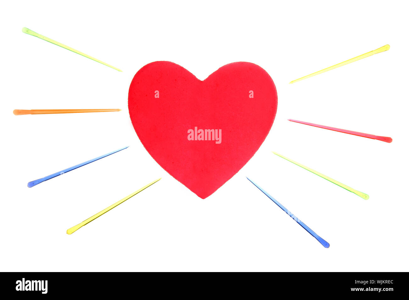 Valentines red heart with color pins isolated on white Stock Photo - Alamy