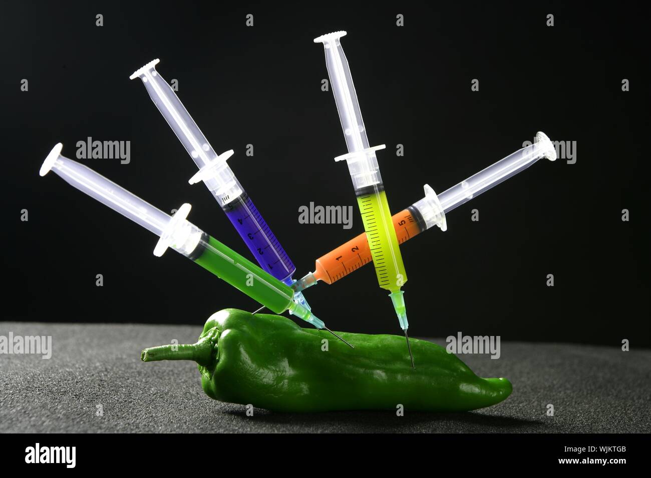 Bio genetics research of food , green pepper and syringes Stock Photo ...