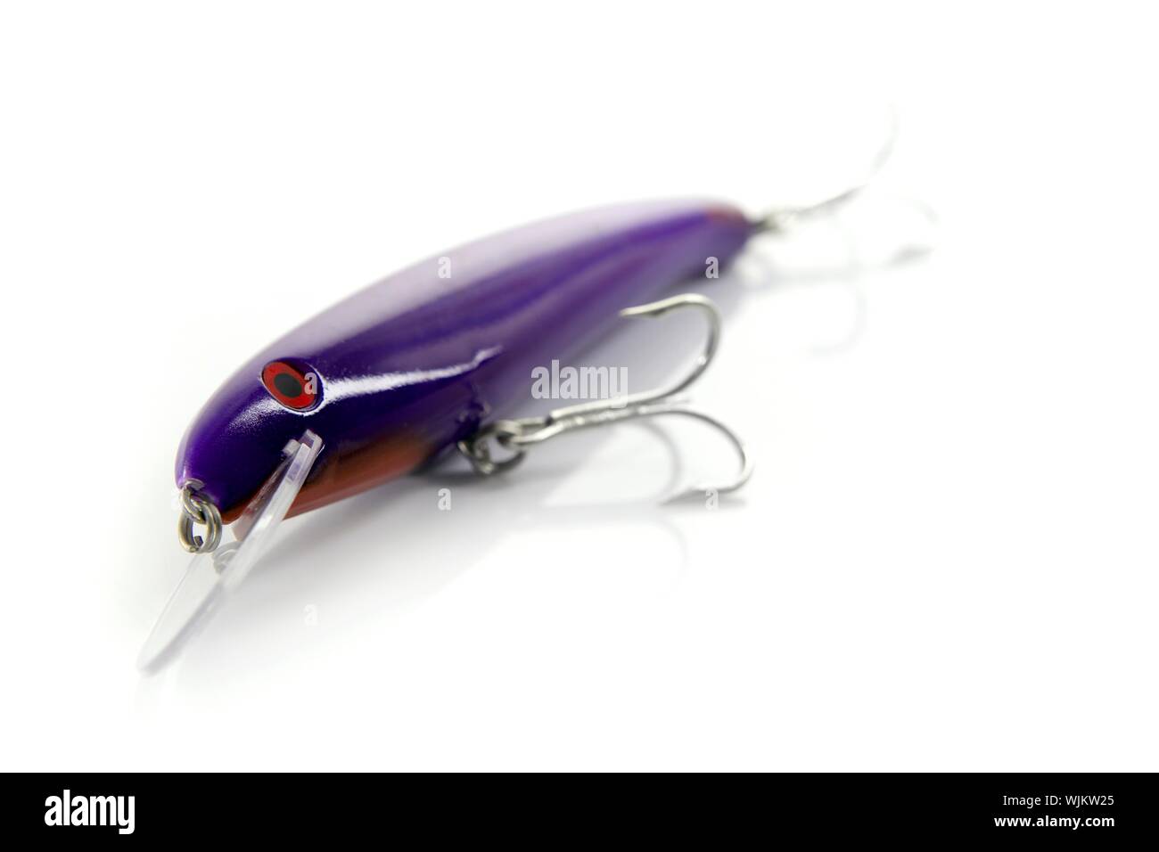 tuna fishing lure purple isolated over white background Stock Photo - Alamy