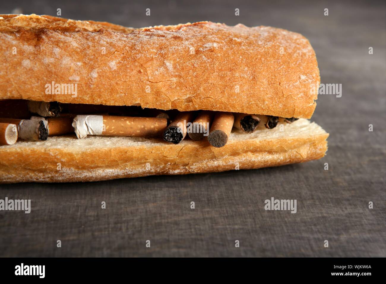 Cigarette bread sandwich menu, tobacco addiction metaphor Stock Photo ...