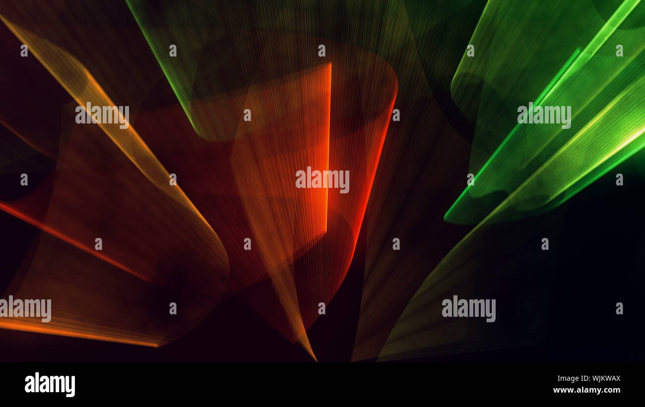 Laser neon red and green light rays flash and glow Stock Photo - Alamy
