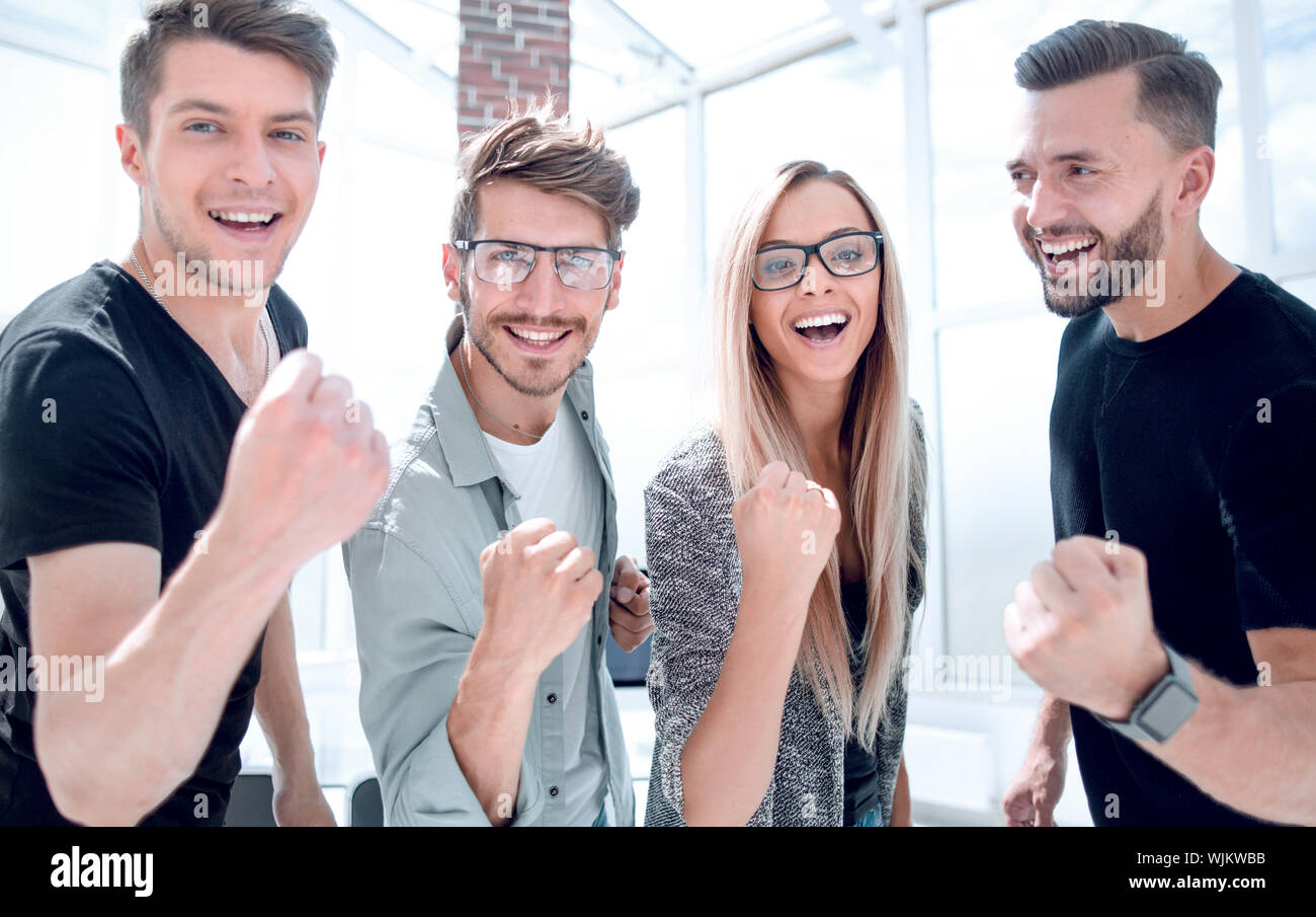 Business team celebrating a good job in the office Stock Photo - Alamy