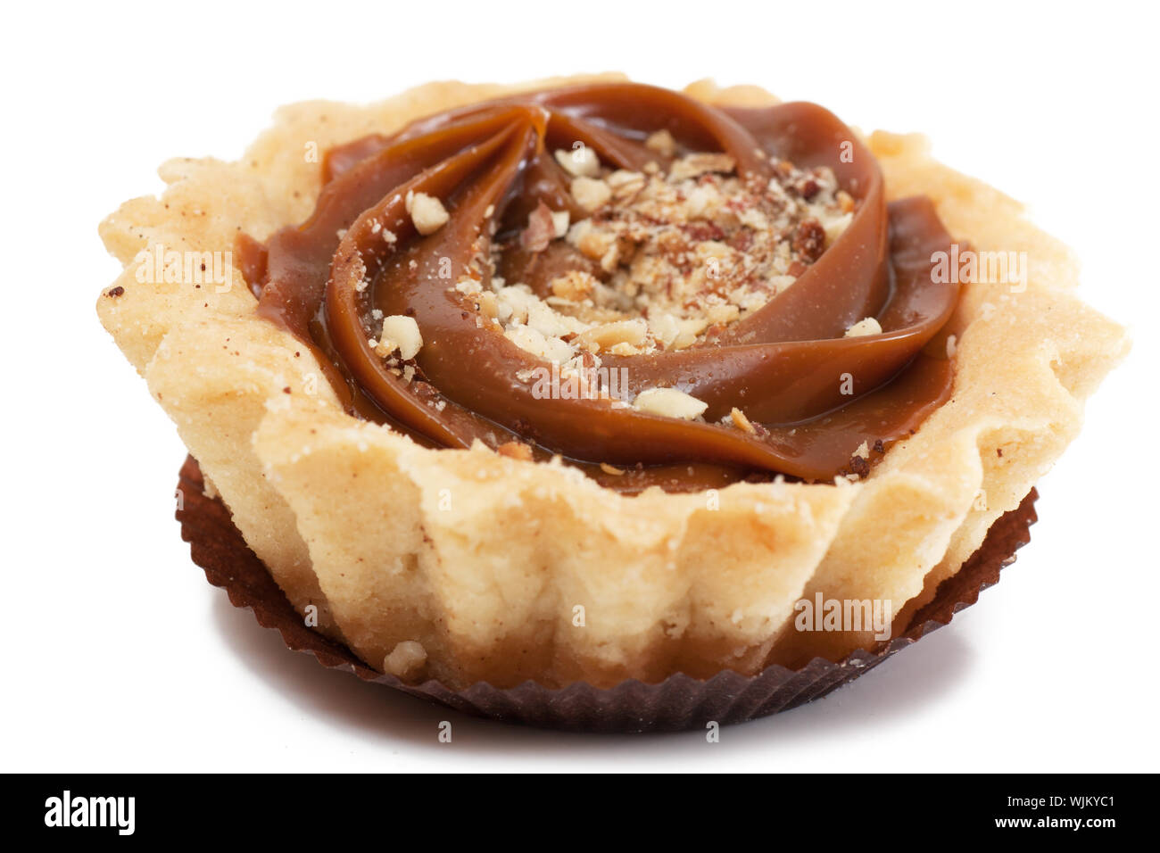 A pastry with nuts isolated over white Stock Photo - Alamy