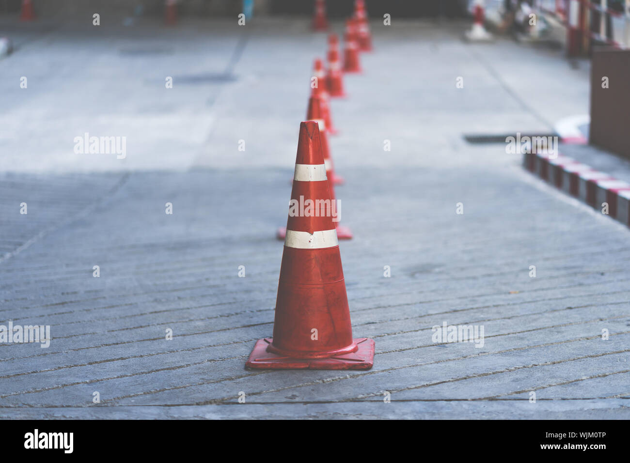 Row of street cones hi-res stock photography and images - Alamy