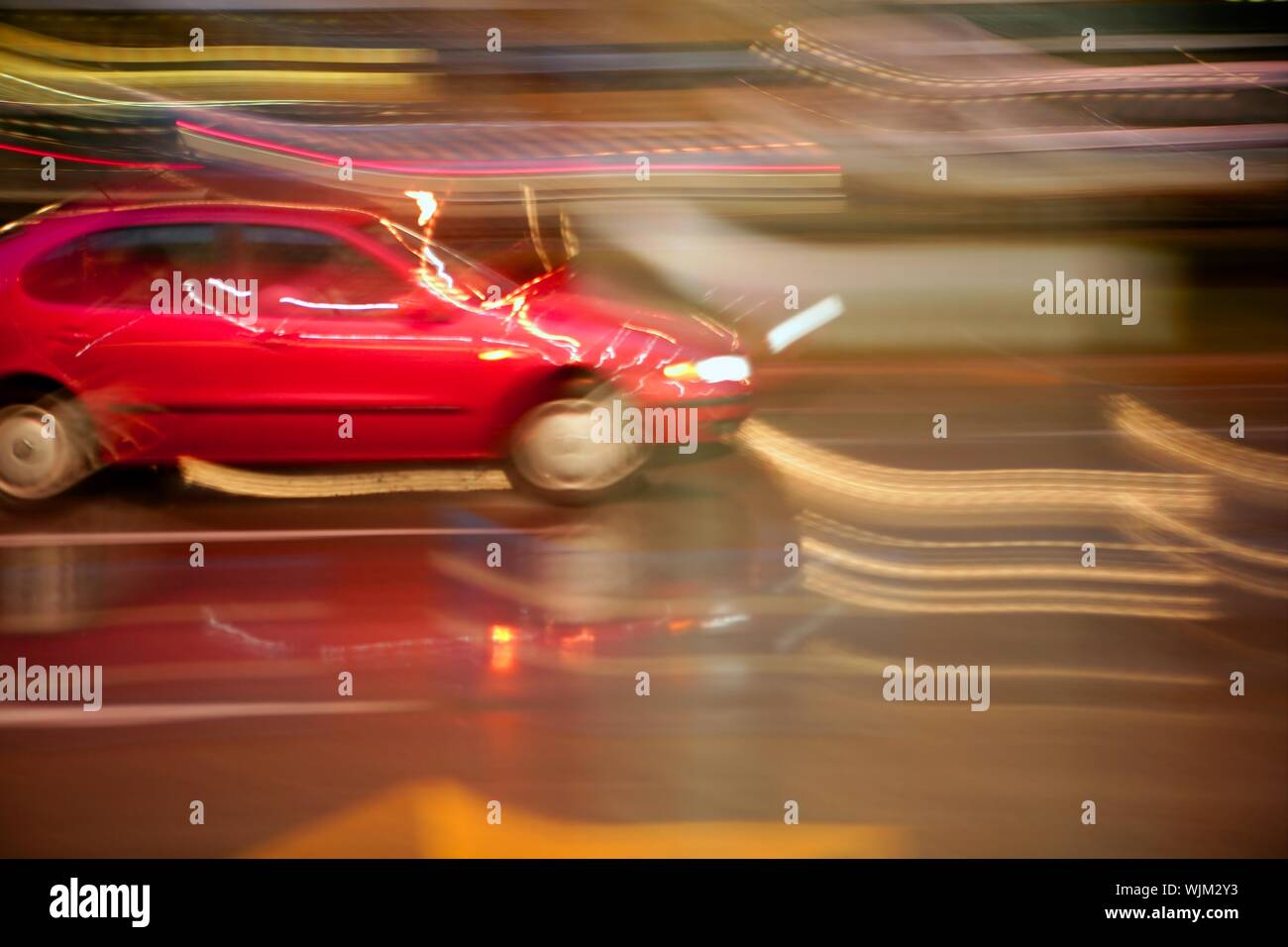 Car moving in rainy night motion blur on light and vehicle Stock Photo ...