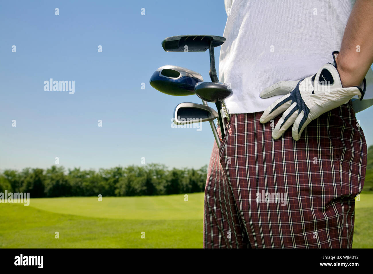 Golf club: golfer moving to the next hole Stock Photo - Alamy