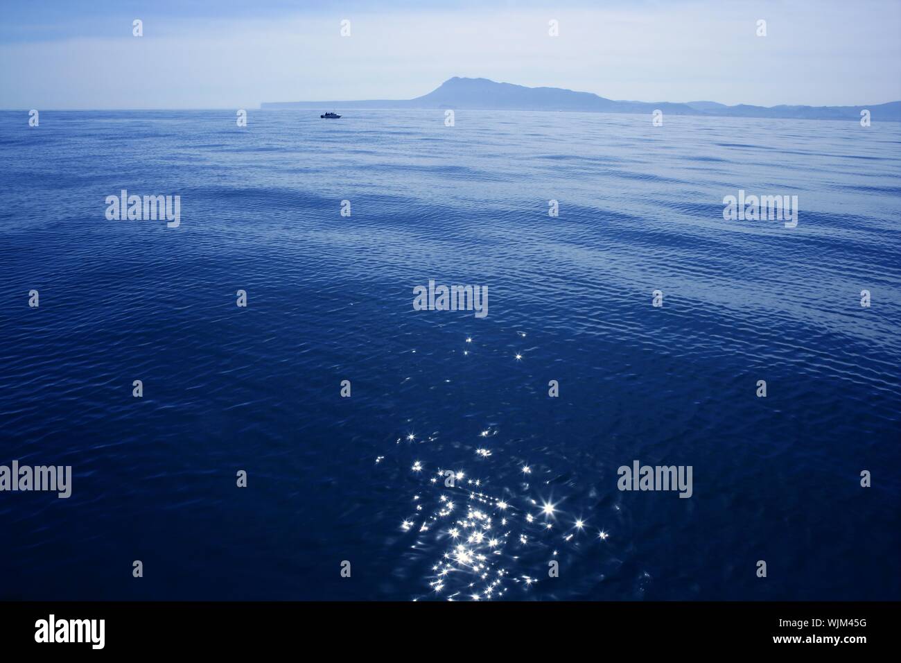 Mediterranean sea in Spain, sun reflexion on blue ocean Stock Photo - Alamy