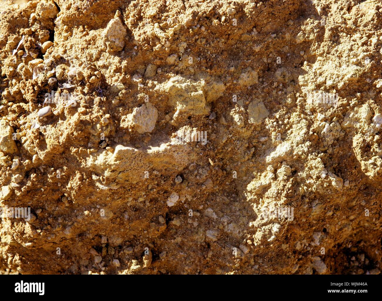 Agriculture field red clay soil texture macro Stock Photo - Alamy