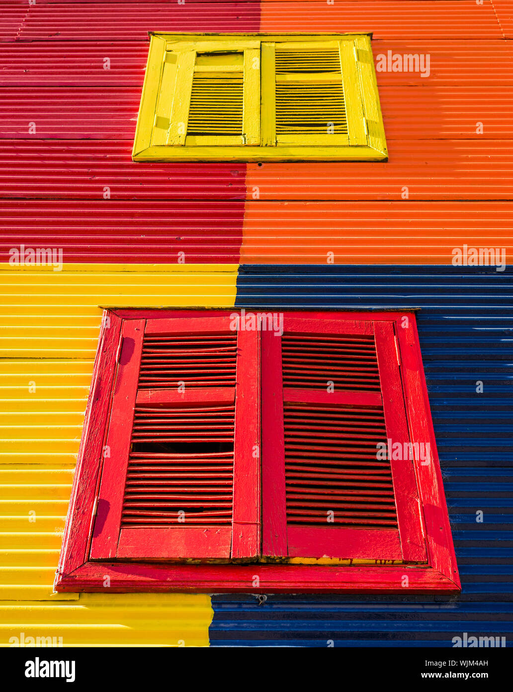 An abstract background with colorful old windows Stock Photo - Alamy