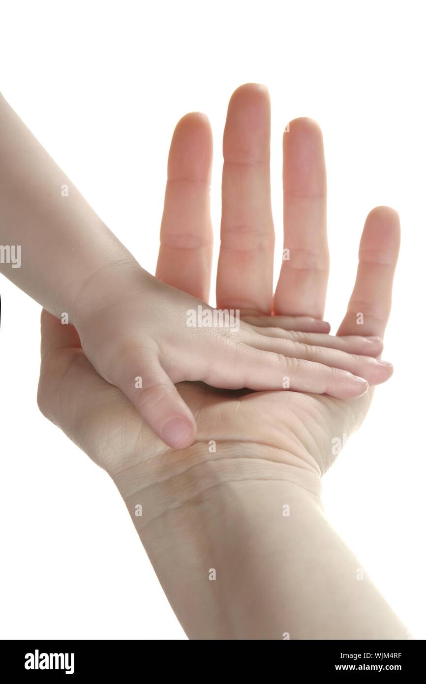 Mother and son, daughter hand together love family sign Stock Photo - Alamy