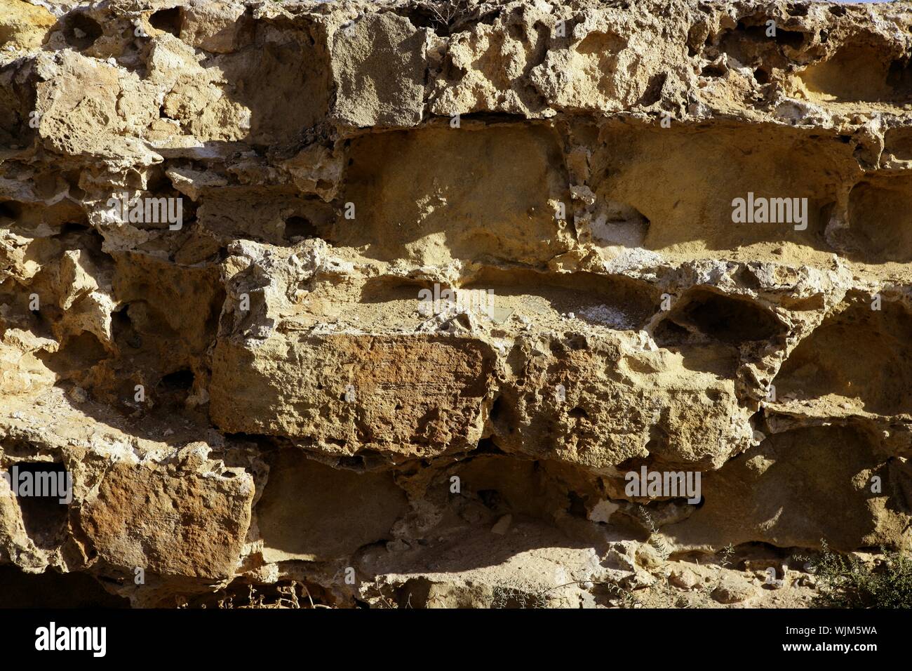 Aged stone walls, masonry architecture backgrounds, Spain Stock Photo ...