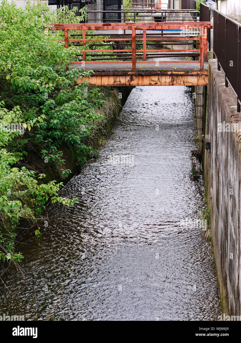 Aqueduct or Water canal running in front of houses in Kyoto, Japan ...